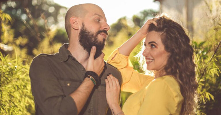 13 Signs He Likes You but Is Trying Hard Not to Show It